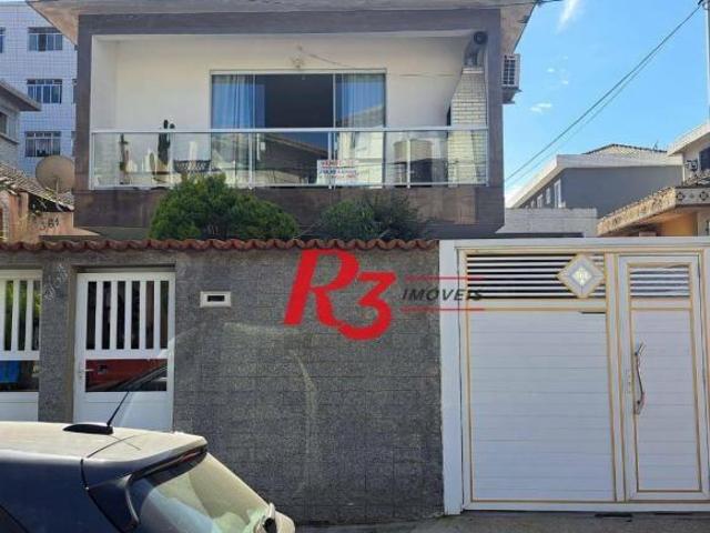Casa com 3 dormitórios à venda, 147 m² por R$ 1.085.000,00 Estuário Santos/SP