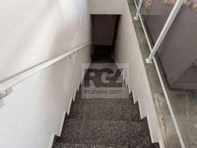 Casa com 3 dormitórios à venda, 148 m² por R$ 1.080.000,00 Aparecida Santos/SP
