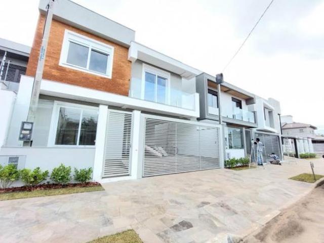 Casa com 3 dormitórios à venda, 154m² por R$ 870.000,00 Canoas/RS