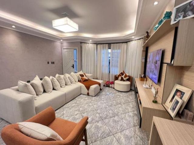 Casa com 3 dormitórios à venda, 155 m² por R$ 850.000,00 Guilhermina Praia Grande/SP