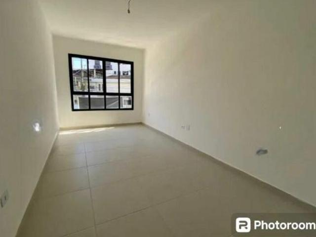 Casa com 3 dormitórios à venda, 156 m² por R$ 1.150.000,00 Aparecida Santos/SP