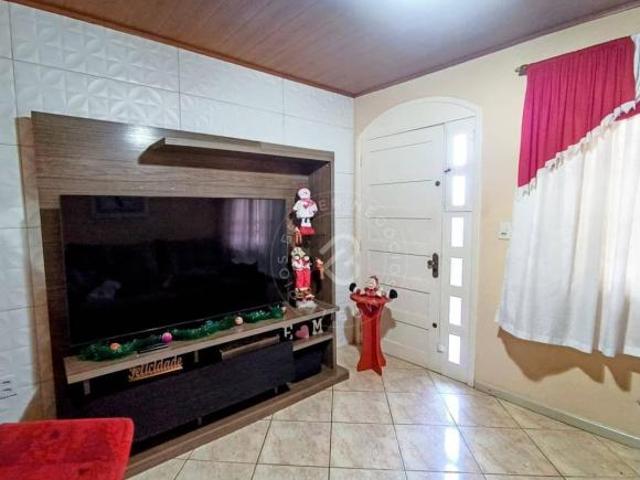 Casa com 3 dormitórios à venda, 156 m² por R$ 850.000,00 Centro Esteio/RS