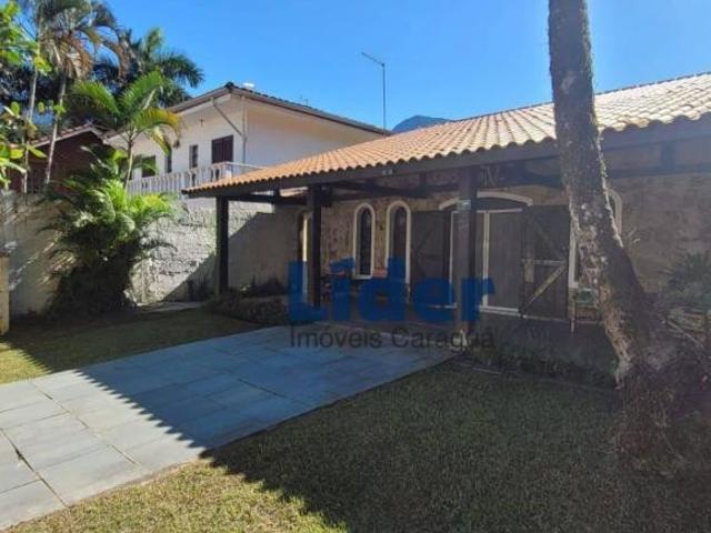 Casa com 3 dormitórios à venda, 157 m² por R$ 590.000,00 Massaguaçu Caraguatatuba/SP