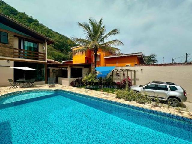 Casa com 3 dormitórios à venda, 158 m² por R$ 1.150.000,00 Guaiuba Guarujá/SP