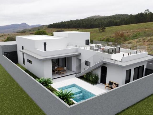 Casa com 3 dormitórios à venda, 158 m² por R$ 940.000,00 Condomínio Ninho Verde II Pardinho/SP