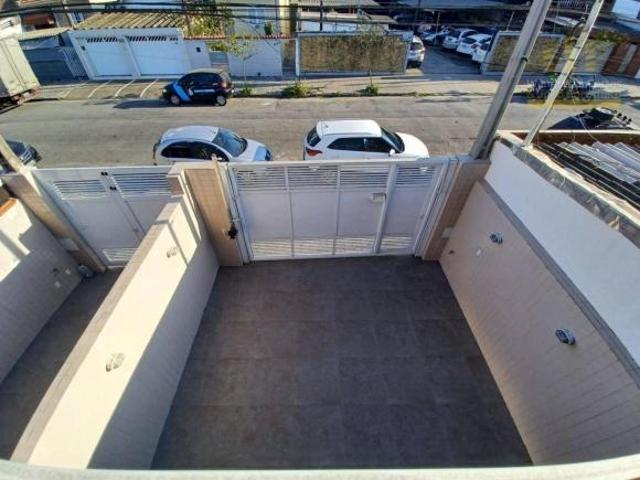 Casa com 3 dormitórios à venda, 150 m² por R$ 1.100.000,00 Aparecida Santos/SP