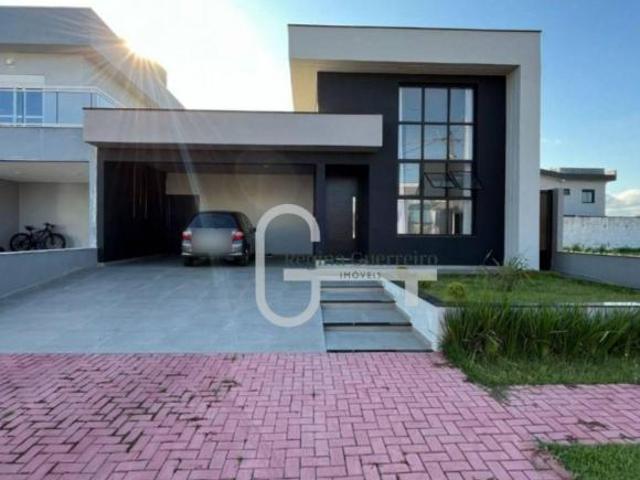 Casa com 3 dormitórios à venda, 150 m² por R$ 1.390.000,00 Condomínio Flora Rica Peruíbe/SP