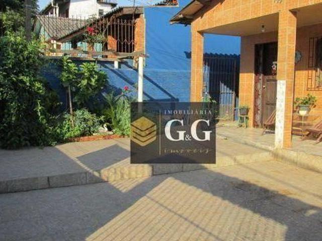 Casa com 3 dormitórios à venda, 150 m² por R$ 260.000,00 Jardim Krahe Viamão/RS