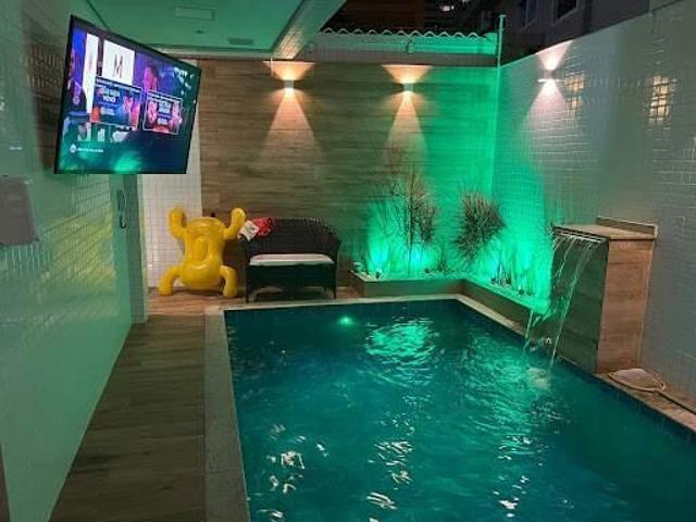 Casa com 3 dormitórios à venda, 150 m² por R$ 2.438.000,00 Ponta da Praia Santos/SP