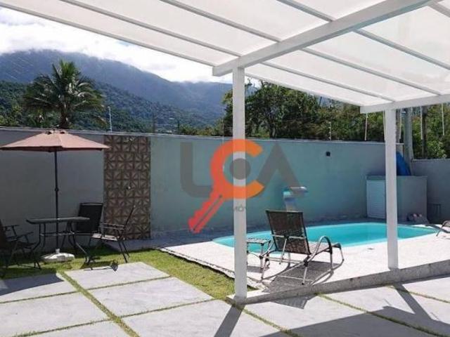 Casa com 3 dormitórios à venda, 150 m² por R$ 960.000,00 Massaguaçu Caraguatatuba/SP