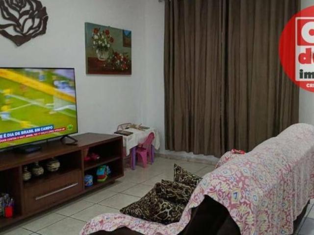 Casa com 3 dormitórios à venda, 153 m² por R$ 725.000,00 Estuário Santos/SP