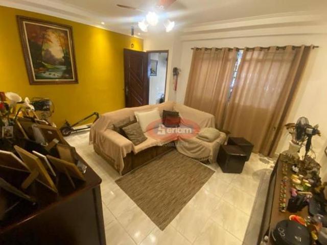 Casa com 3 dormitórios à venda, 167 m² por R$ 650.000,00 Macuco Santos/SP
