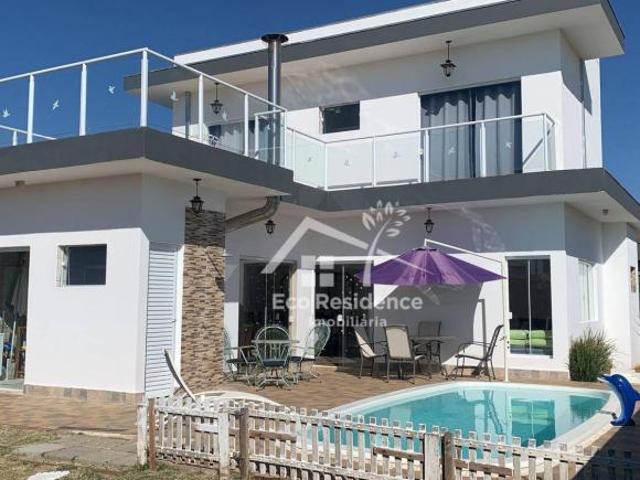 Casa com 3 dormitórios à venda, 162 m² por R$ 780.000 Ninho Verde II Pardinho/SP