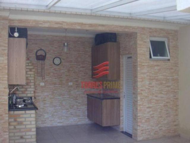 Casa com 3 dormitórios à venda, 170 m² por R$ 1.600.000,00 Aparecida Santos/SP