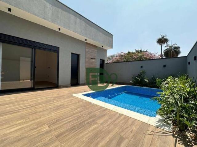 Casa com 3 dormitórios à venda, 187 m² por R$ 1.700.000,00 Condomínio Villa Carioba Americana/SP