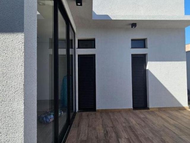 Casa com 3 dormitórios à venda, 188 m² por R$ 1.390.000,00 Condomínio Reserva dos Ipês Uberlândi
