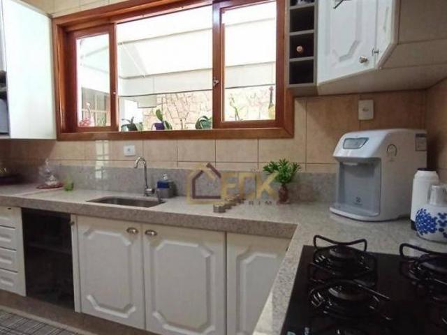 Casa com 3 dormitórios à venda, 180 m² por R$ 680.000,00 Vila São José Taubaté/SP