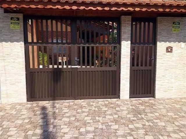 Casa com 3 dormitórios à venda, 181 m² por R$ 620.000,00 Vila Guilhermina Praia Grande/SP