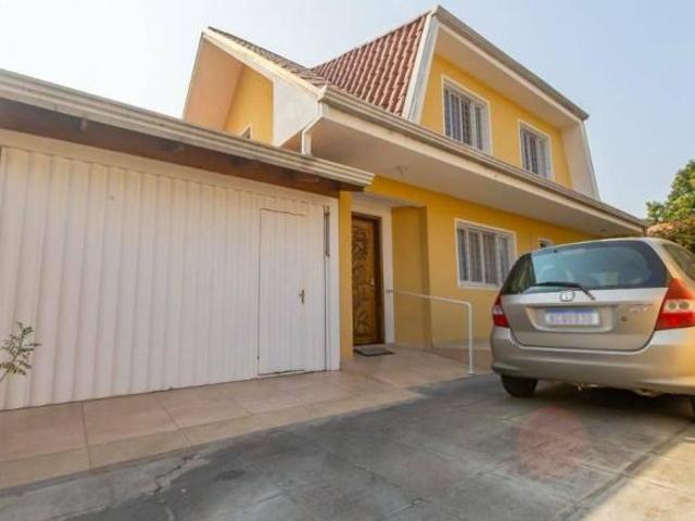 Casa com 3 dormitórios à venda, 183 m² por R$ 890.000,00 Cajuru Curitiba/PR