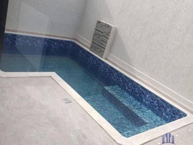 Casa com 3 dormitórios à venda, 183 m² por R$ 890.000,00 Condomínio Residencial Tecoara Taubaté/
