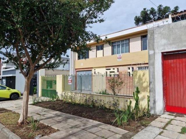 Casa com 3 dormitórios à venda, 194 m² por R$ 870.000,00 Agua Verde Curitiba/PR