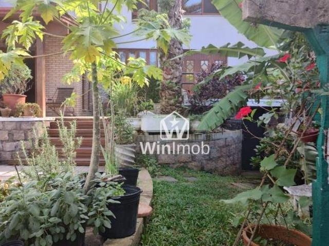 Casa com 3 dormitórios à venda, 197 m² por R$ 900.000,00 Condomínio Cantegril Viamão/RS