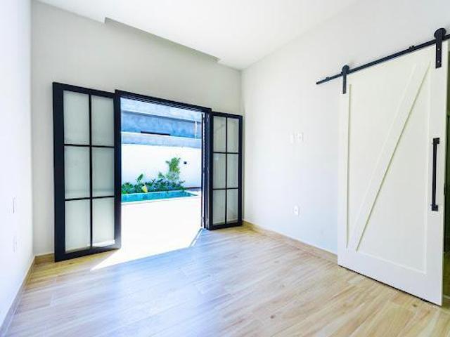 Casa com 3 dormitórios à venda, 190 m² por R$ 2.100.000,00 Condomínio Dona Maria Cândida Indaiat