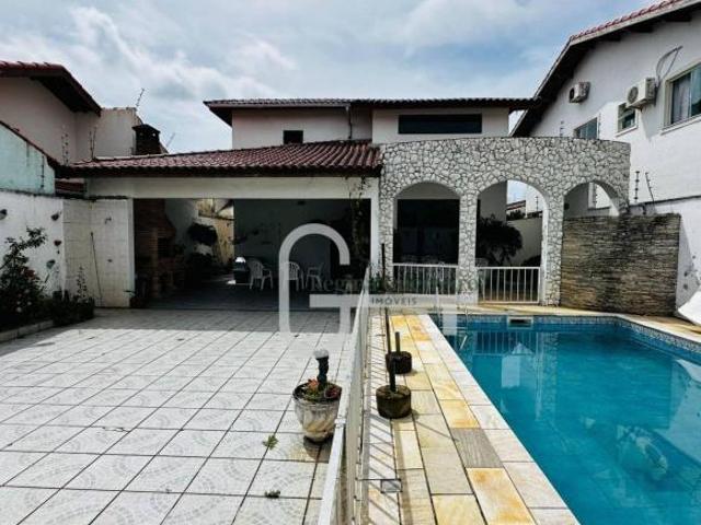 Casa com 3 dormitórios à venda, 190 m² por R$ 699.000,00 Balneário Stella Maris Peruíbe/SP