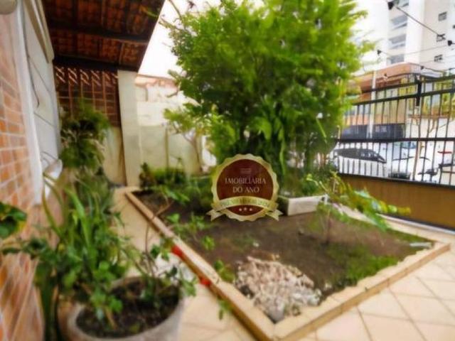 Casa com 3 dormitórios à venda, 206 m² por R$ 750.000,00 Maracanã Praia Grande/SP