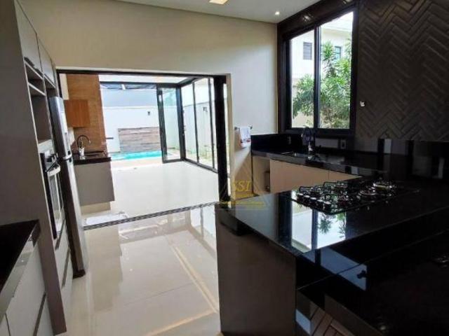 Casa com 3 dormitórios à venda, 200 m² por R$ 2.000.000,00 Parque Universitário Condomínio Olivi