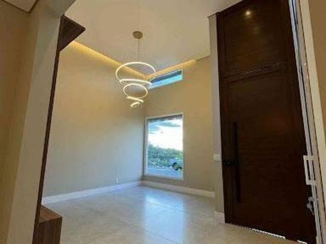Casa com 3 dormitórios à venda, 216 m² por R$ 2.300.000,00 Parque Universitário Condomínio Villa