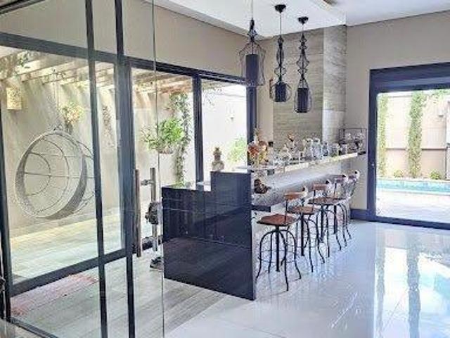 Casa com 3 dormitórios à venda, 219 m² por R$ 1.600.000,00 Condom