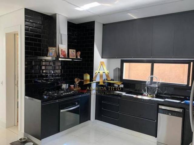 Casa com 3 dormitórios à venda, 210 m² por R$ 2.150.000,00 Condomínio New Ville Santana de Parna