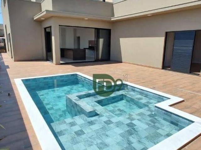 Casa com 3 dormitórios à venda, 224 m² por R$ 2.000.000,00 Condomínio Phillipson Park Americana/