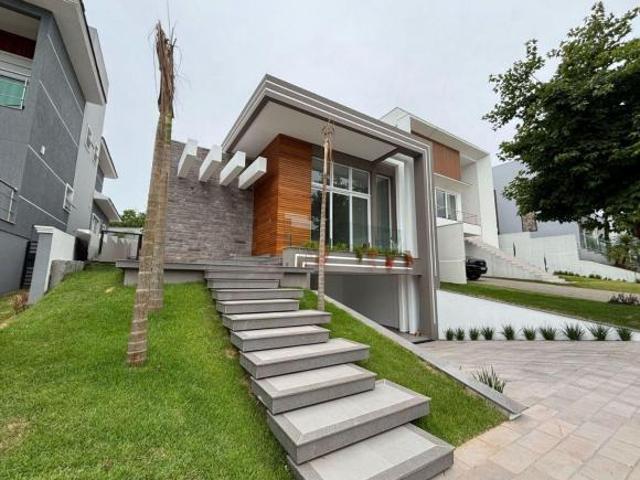 Casa com 3 dormitórios à venda, 220 m² por R$ 2.190.000,00 Alphaville Gravataí/RS