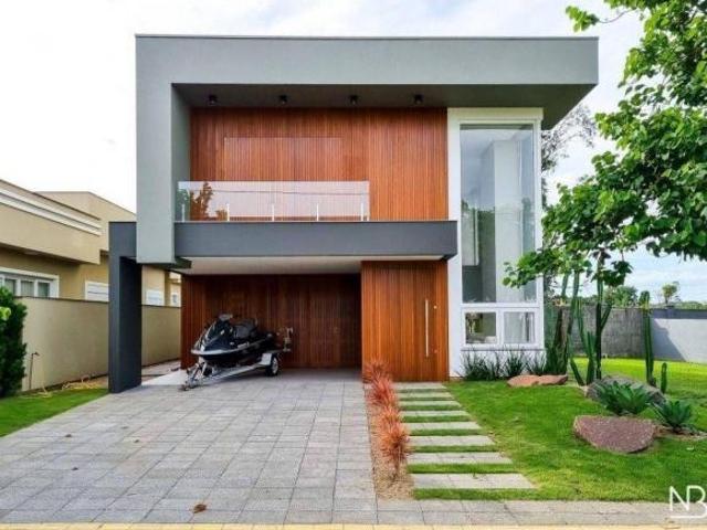 Casa com 3 dormitórios à venda, 230 m² por R$ 3.190.000,00 Alphaville Gravat
