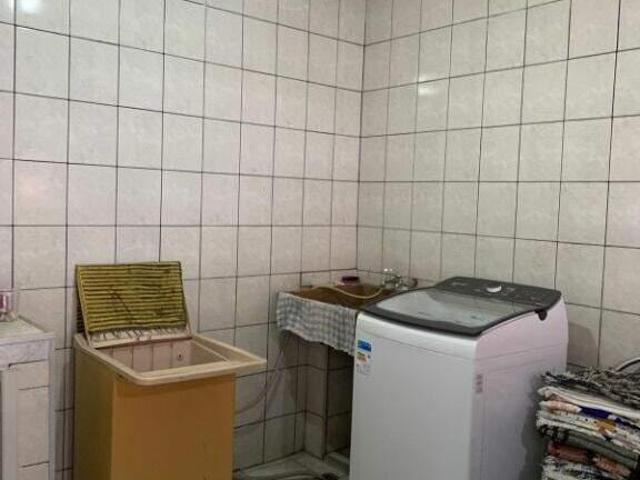 Casa com 3 dormitórios à venda, 232 m² por R$ 600.000 Parque Marajoara Santo