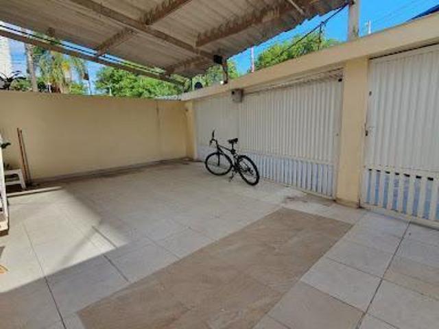 Casa com 3 dormitórios à venda, 243 m² por R$ 1.000.000,00 Aparecida Santos/SP
