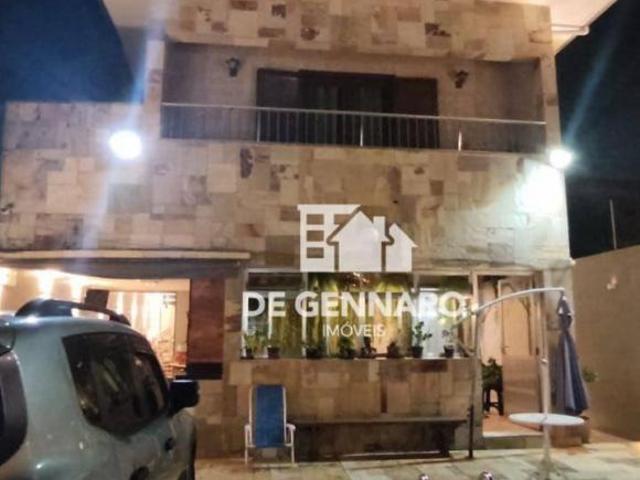 Casa com 3 dormitórios à venda, 254 m² por R$ 1.300.000,00 Caiçara Praia Grande/SP