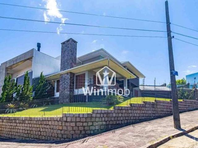 Casa com 3 dormitórios à venda, 258 m² por R$ 1.275.000,00 Jardim Planalto Porto Alegre/RS