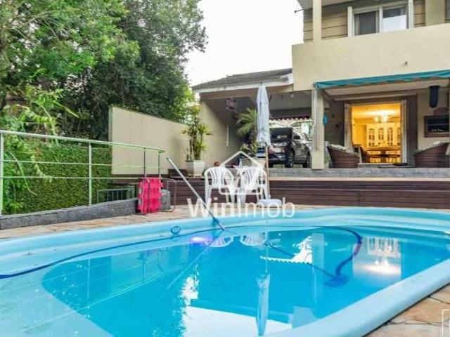 Casa com 3 dormitórios à venda, 262 m² por R$ 1.246.000,00 Condomínio Cantegril Viamão/RS