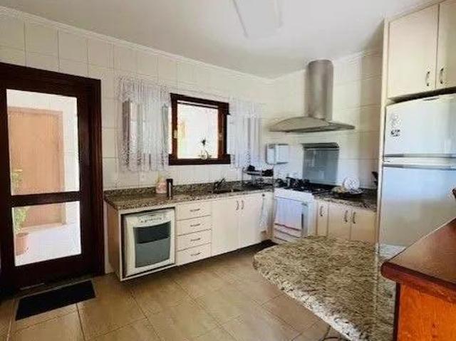 Casa com 3 dormitórios à venda, 263 m² por R$ 1.500.000 Condomínio Vale do Lag