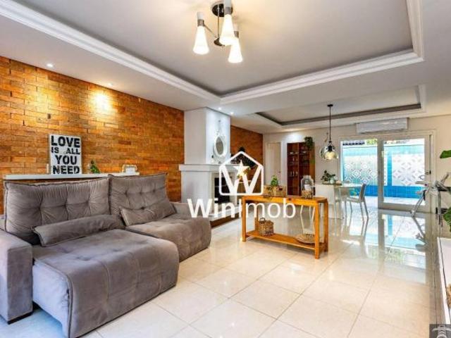 Casa com 3 dormitórios à venda, 263 m² por R$ 1.500.000,00 Ecoville Porto Alegre/RS