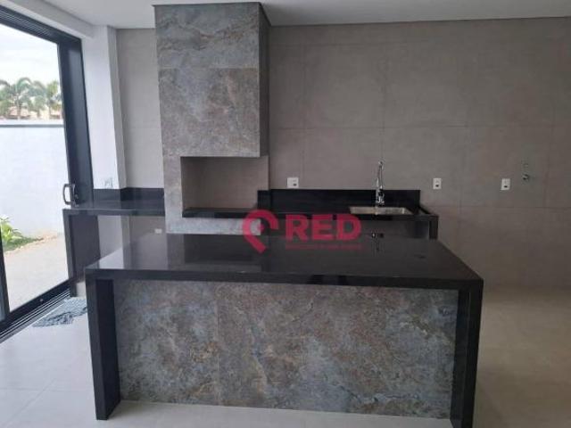 Casa com 3 dormitórios à venda, 285 m² por R$ 2.300.000,00 Condomínio Evidence Residencial Araço