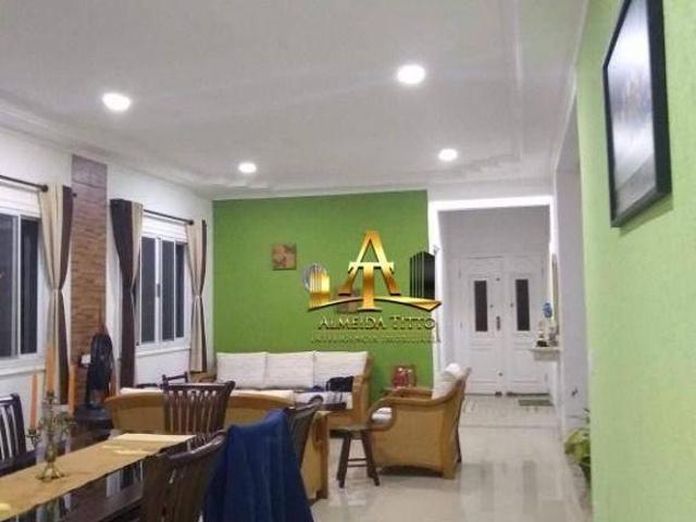 Casa com 3 dormitórios à venda, 290 m² por R$ 2.250.000,00 Condomínio New Ville Santana de Parna