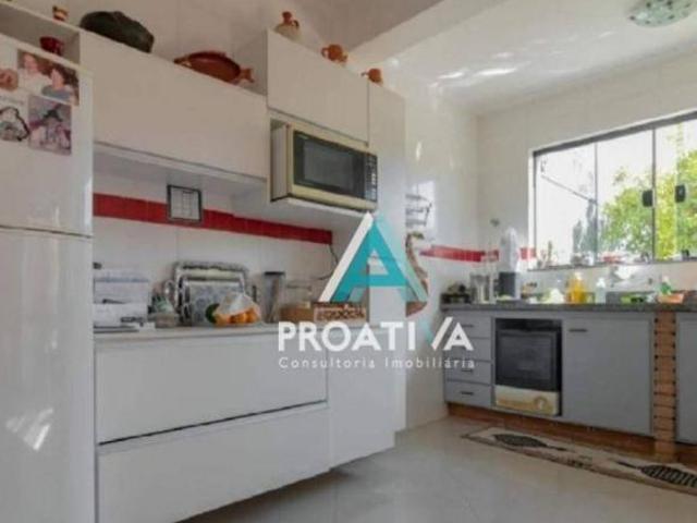 Casa com 3 dormitórios à venda, 309 m² Vila Scarpelli Santo André/SP