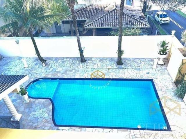 Casa com 3 dormitórios à venda, 302 m² por R$ 1.915.000,00 Condomínio Residencial Terras do Caribe