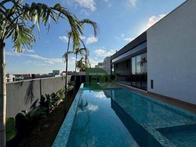 Casa com 3 dormitórios à venda, 310 m² por R$ 3.500.000,00 Condomínio Phillipson Park Americana/