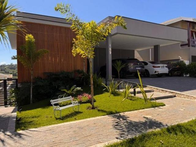 Casa com 3 dormitórios à venda, 310 m² por R$ 2.680.000,00 Condomínio Residencial Terras do Caribe
