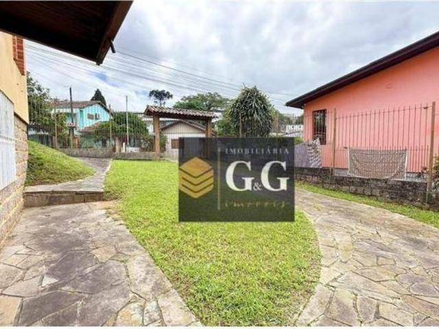 Casa com 3 dormitórios à venda, 311 m² por R$ 880.730,00 Centro Viamão/RS